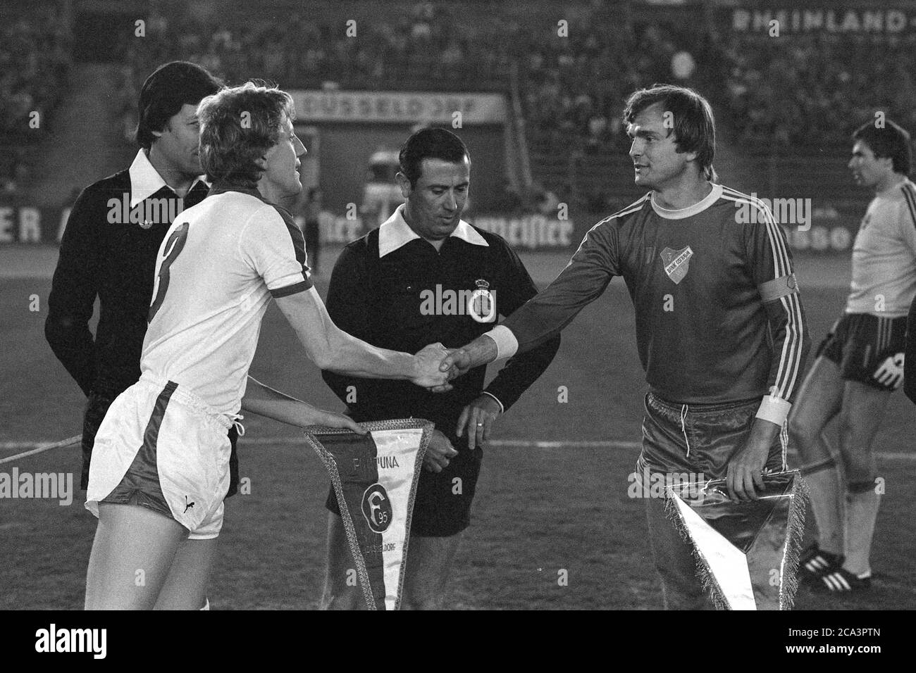 Duesseldorf, Deutschland. 31st July, 2020. the two team captains Gerd ...