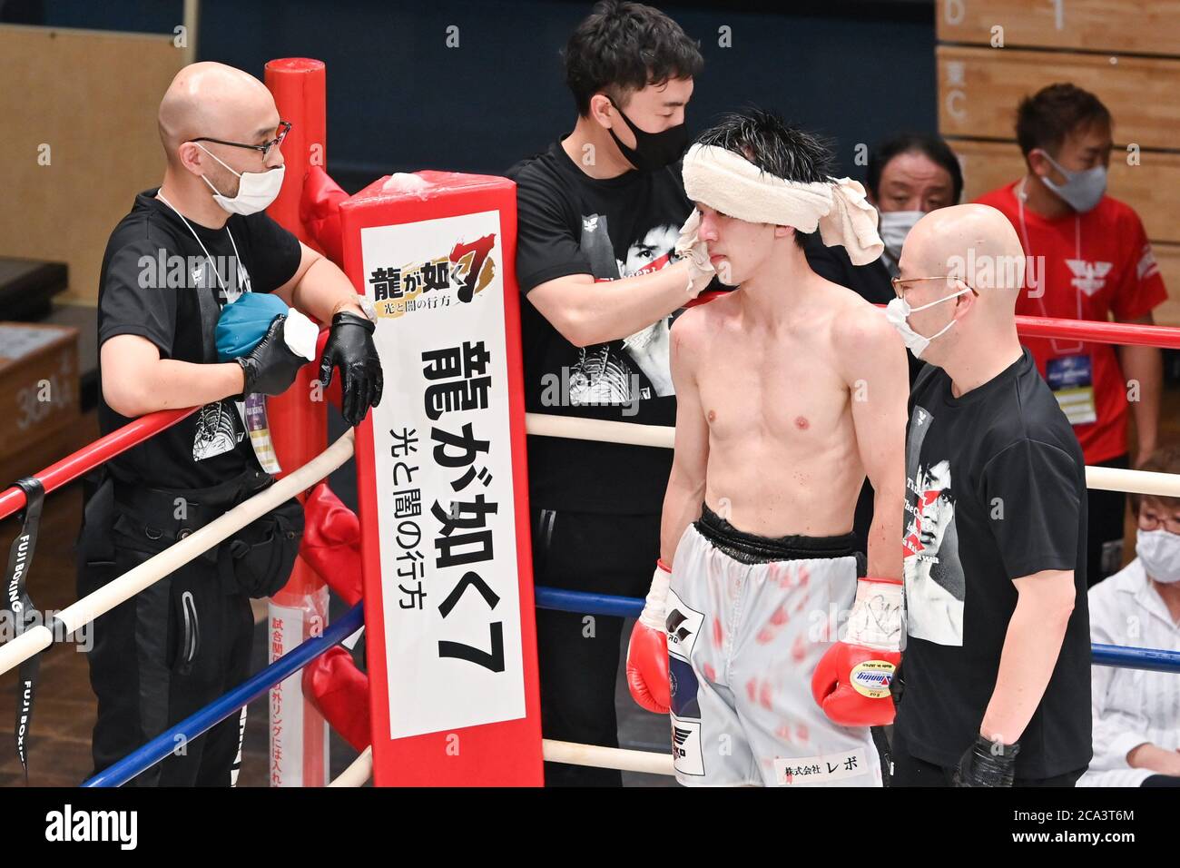 Champiopn Kenta Nakagawa (red gloves) after winning the Japanese super flyweight title bout on ...