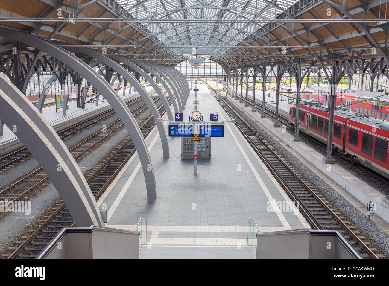 Interior of Lübeck main railway station. Empty platform with no trains ...