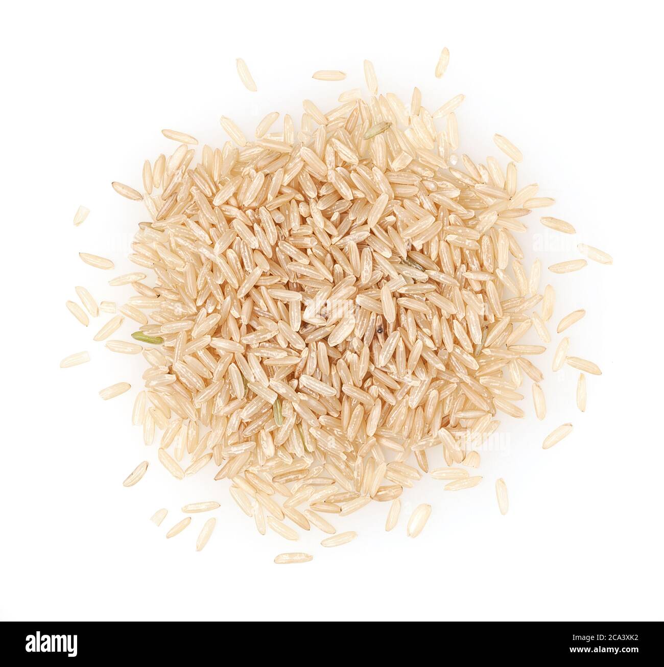 Heap of brown rice isolated on white background Stock Photo - Alamy