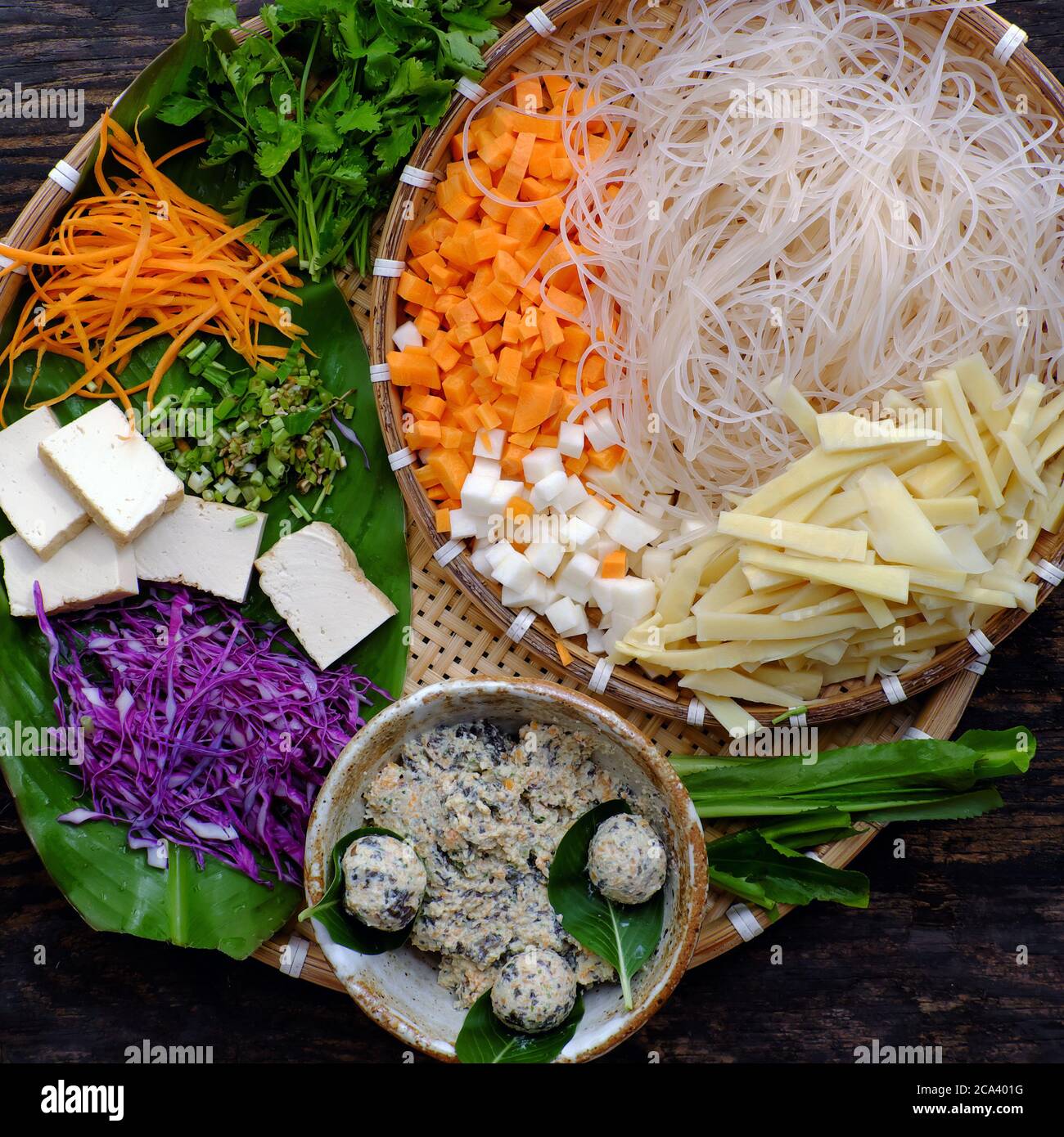tray of raw materials vegan noodles soup, colorful vegetables as carrot ...