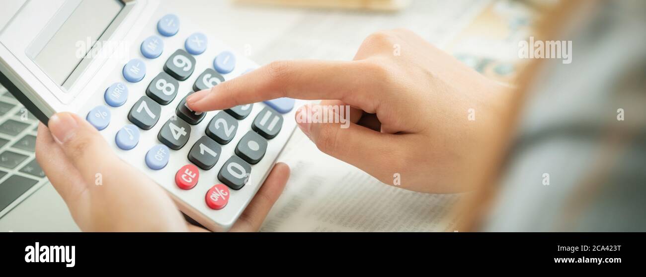 Banker calculator hi-res stock photography and images - Alamy