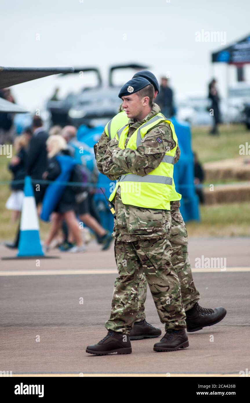 RAF Personnel Patrol the runway At RAF Fairford Gloucester Stock Photo ...
