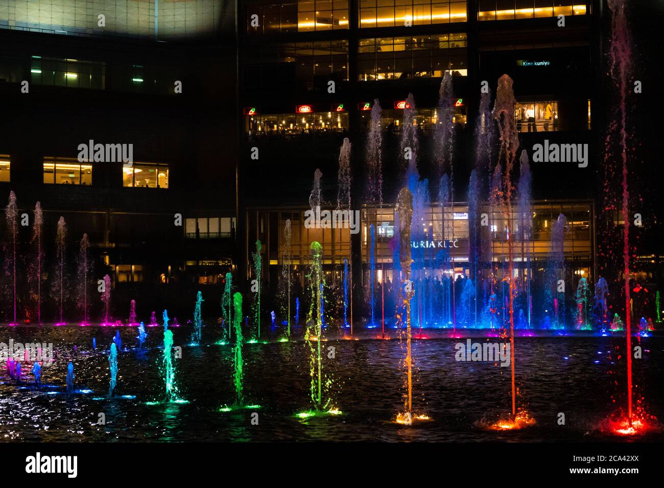 Night view of the dancing multi-colored fountains. Show of Singing ...