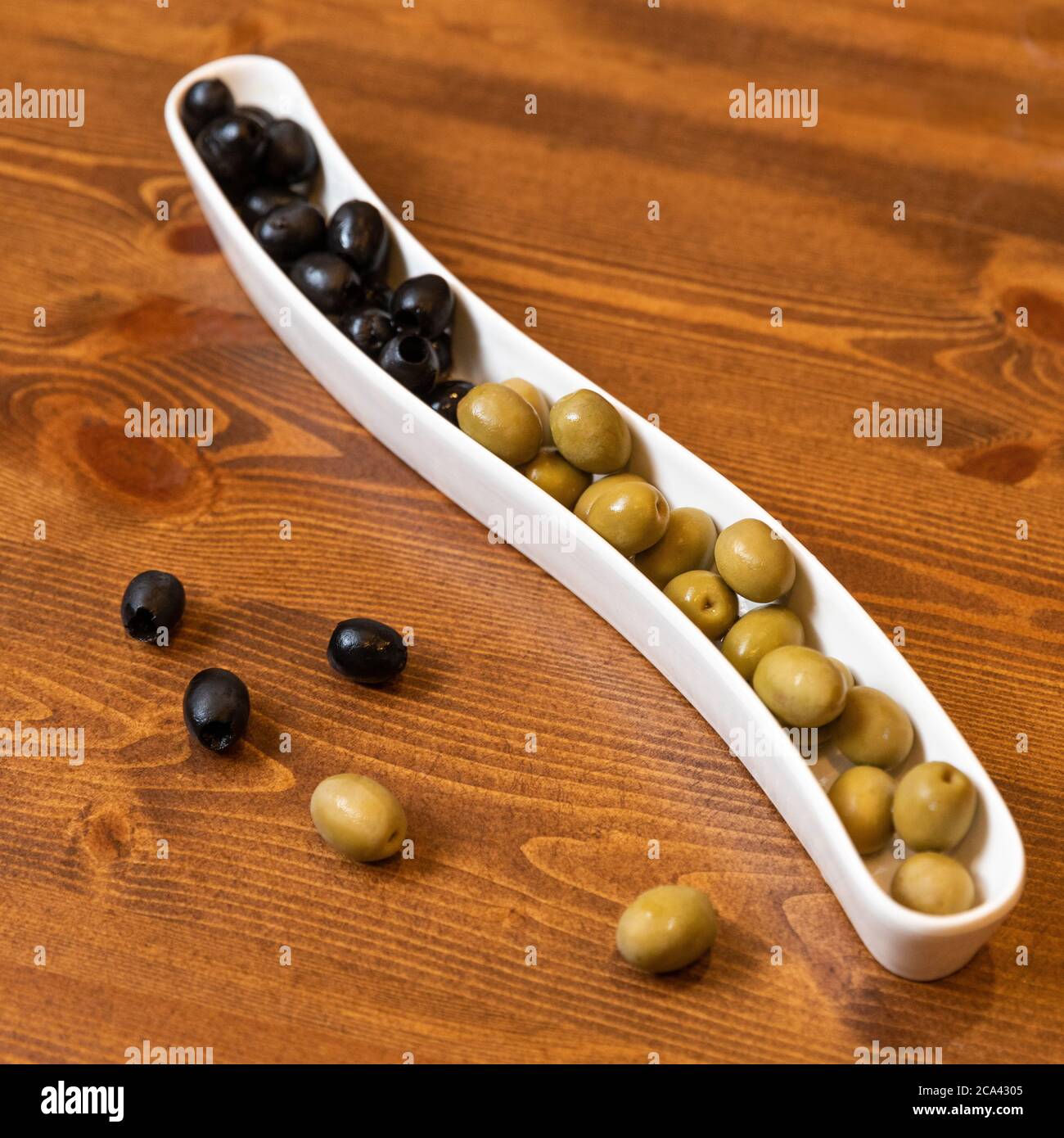 Black and white olives top view Stock Photo - Alamy