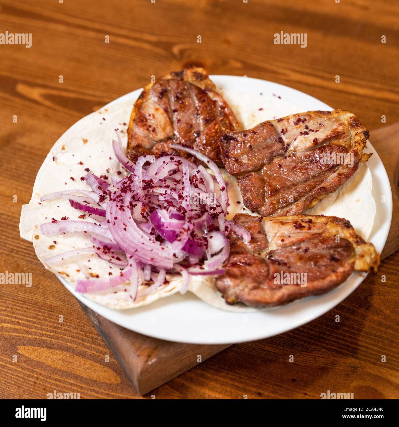 Fried porterhouse steak bone hi-res stock photography and images - Alamy