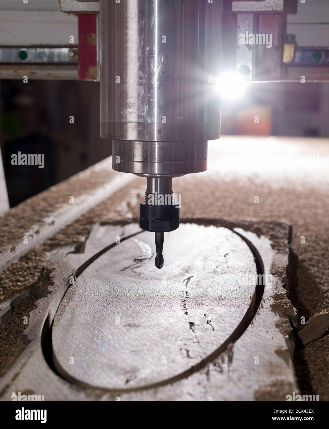 Woodwork cnc machine working on wood board. Machine tool at the wood ...