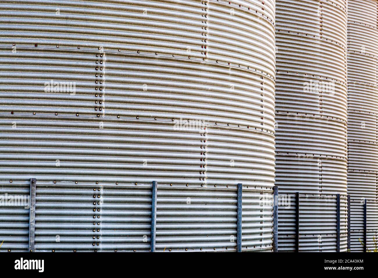 A full frame photograph of large grain elevators on a farm Stock Photo ...