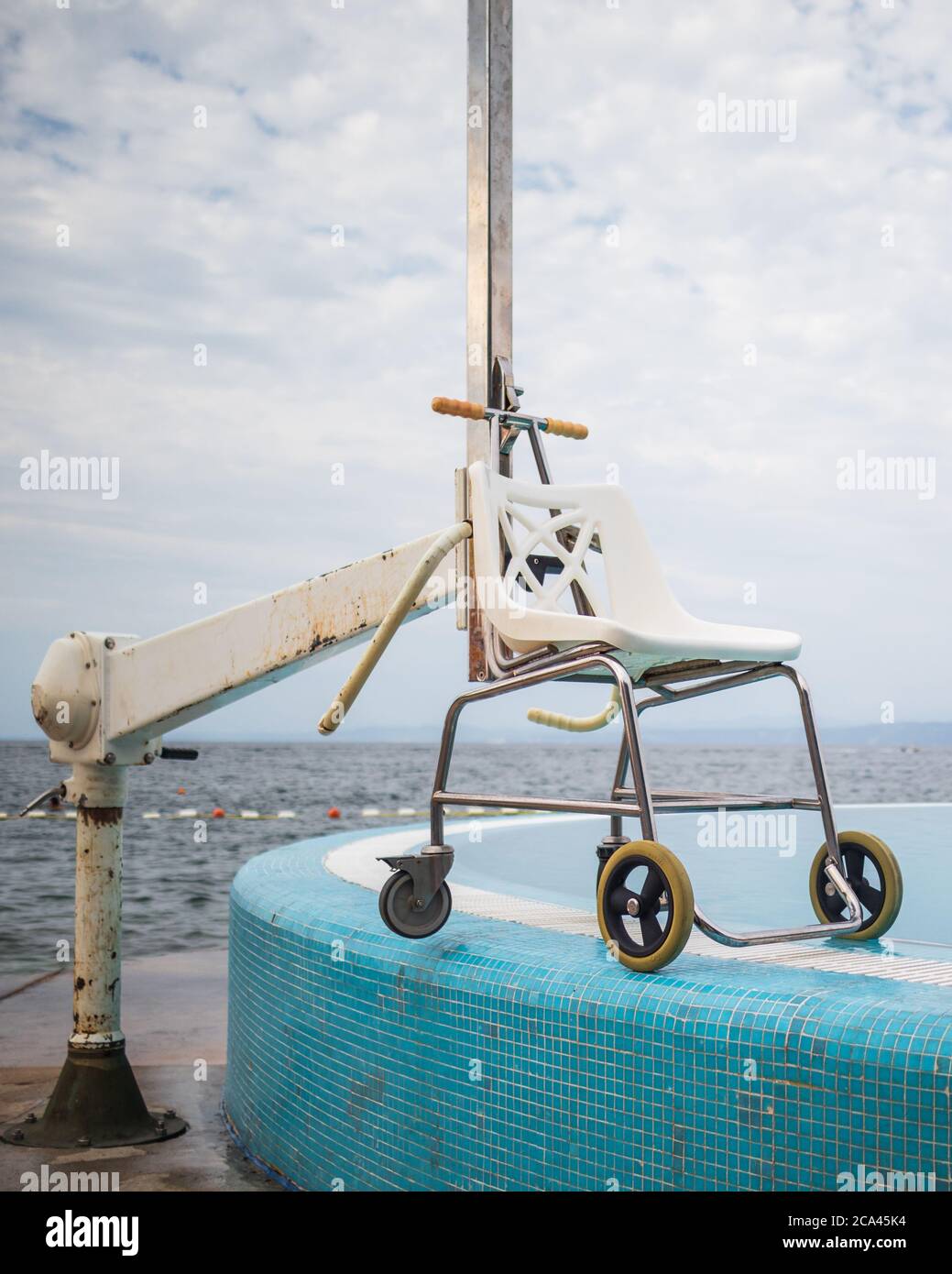 Accessible beach and pool with lift for disabled swimmers Stock Photo ...