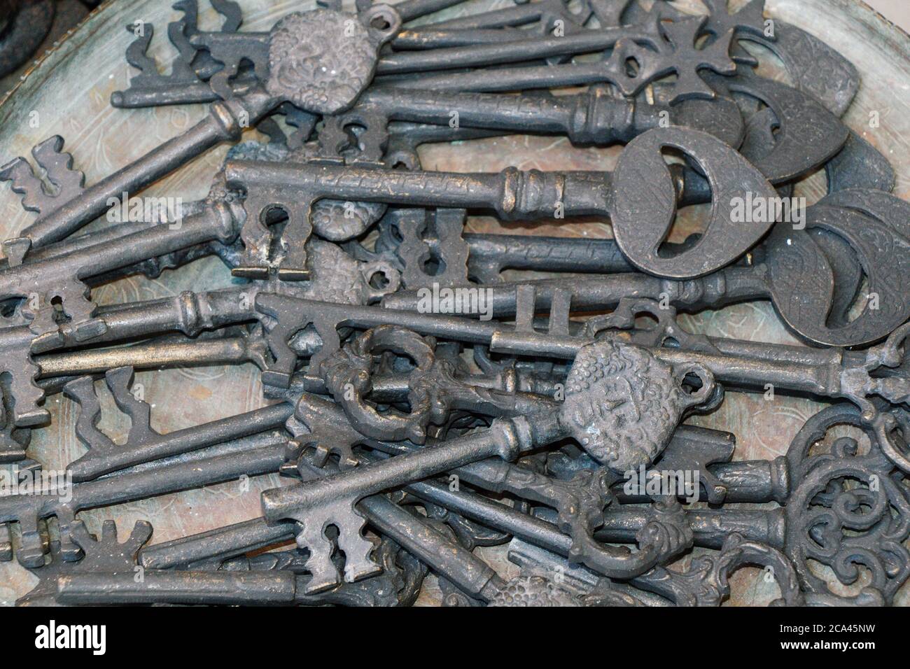 Antique styled color decorativel key made of metal Stock Photo - Alamy