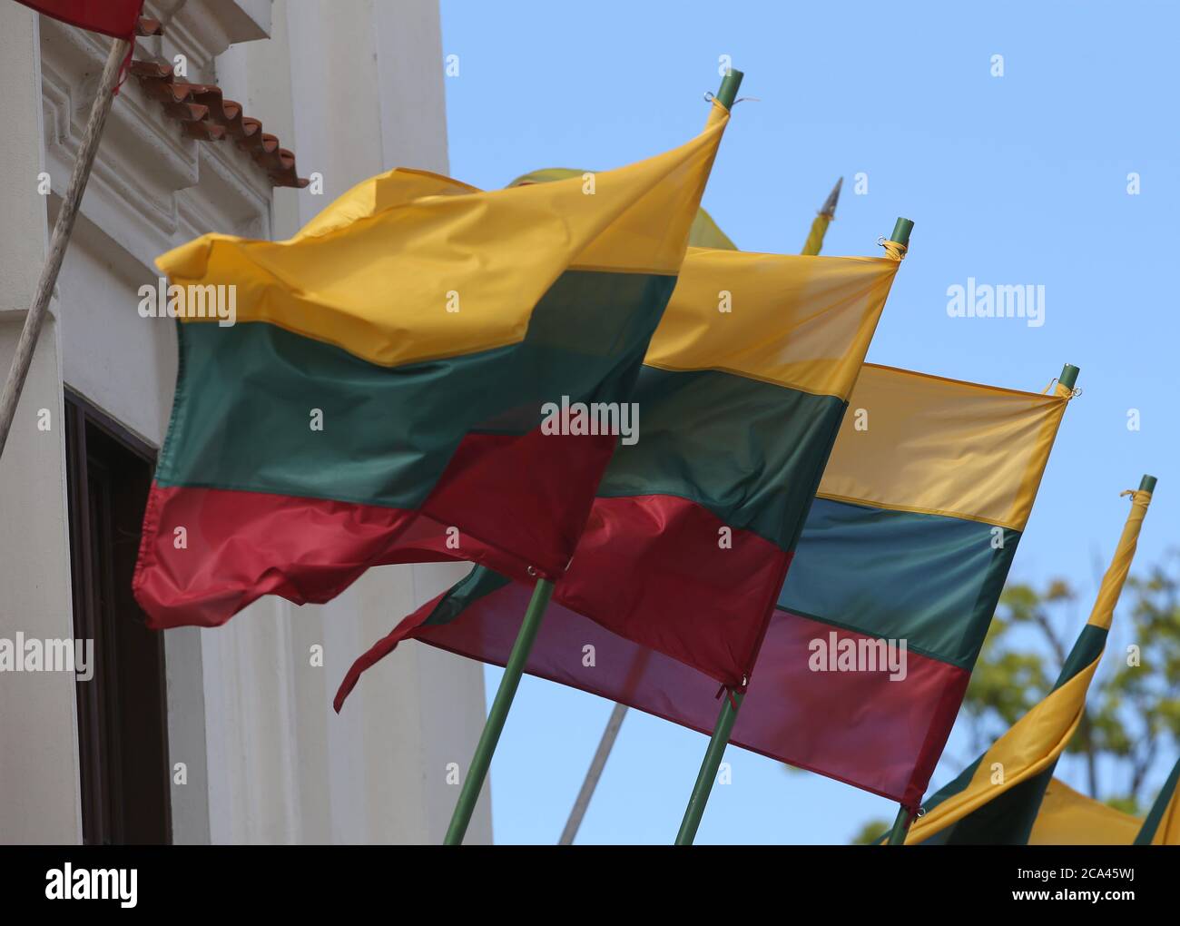 The Lithuanian flag is waving in tricolor over the city Kaunas Stock ...