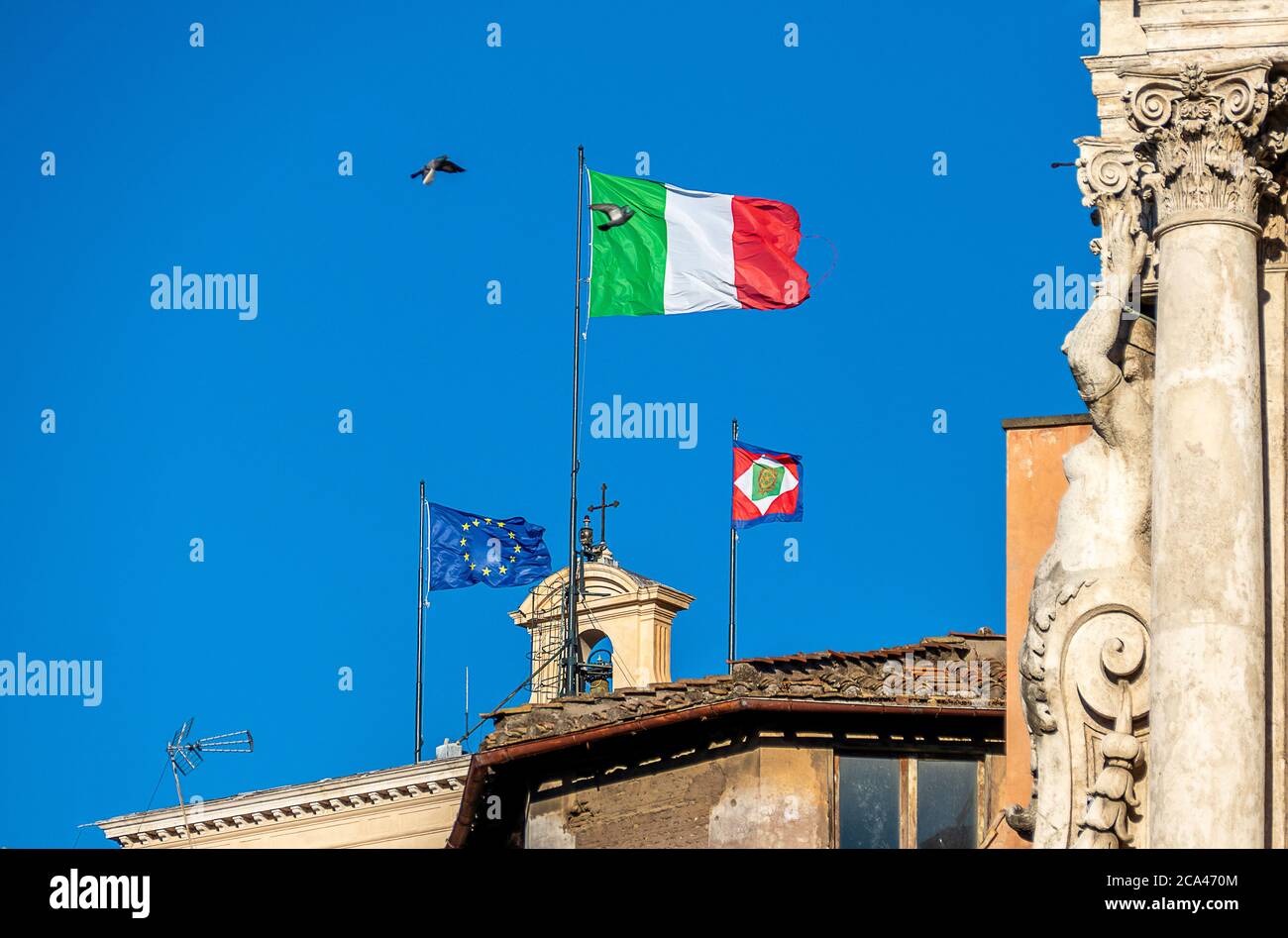 Italian national flag flying on public buildings in Rome Stock Photo ...