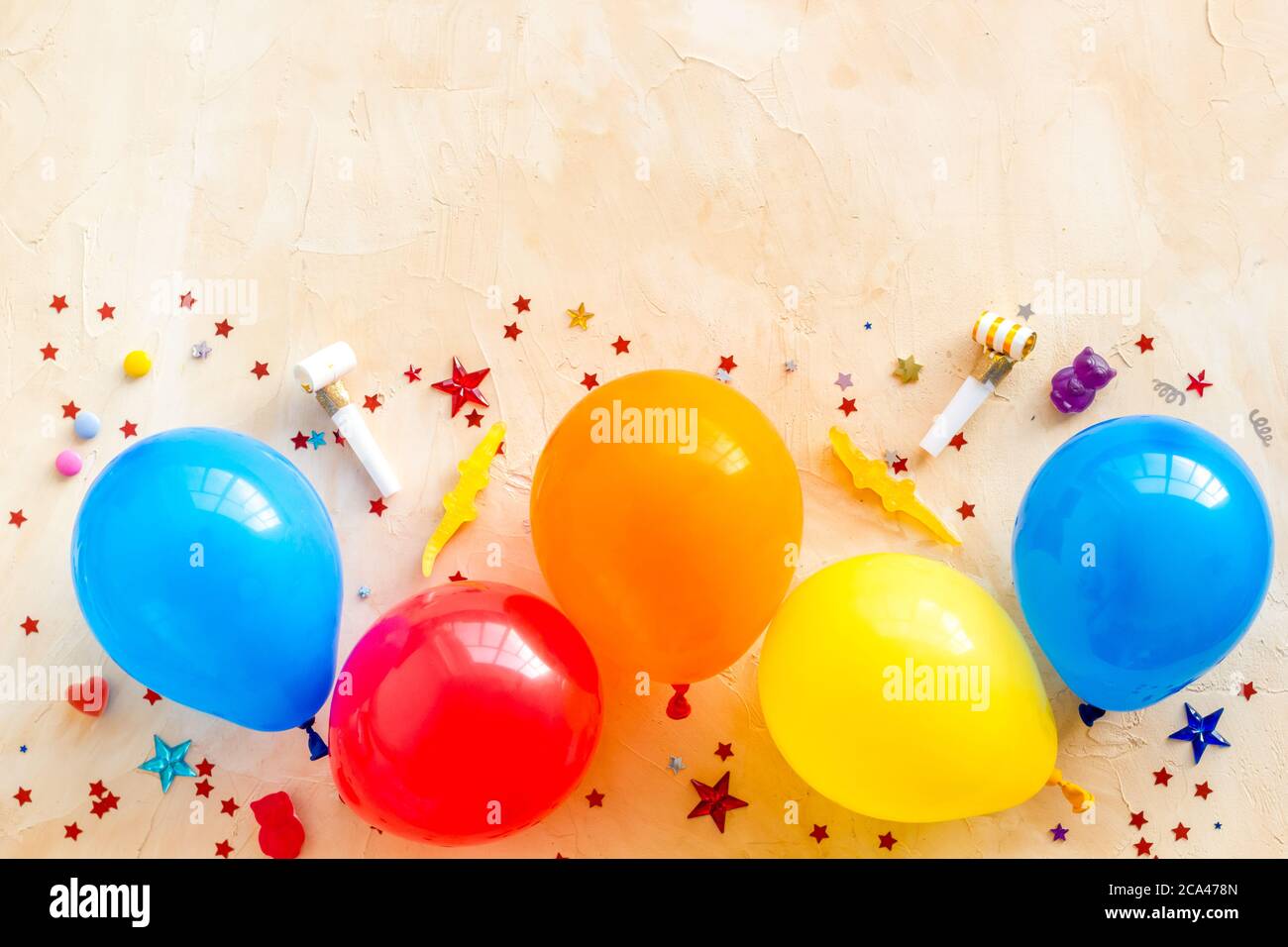 Flat lay with ballons - party concept - on beige background top-down ...
