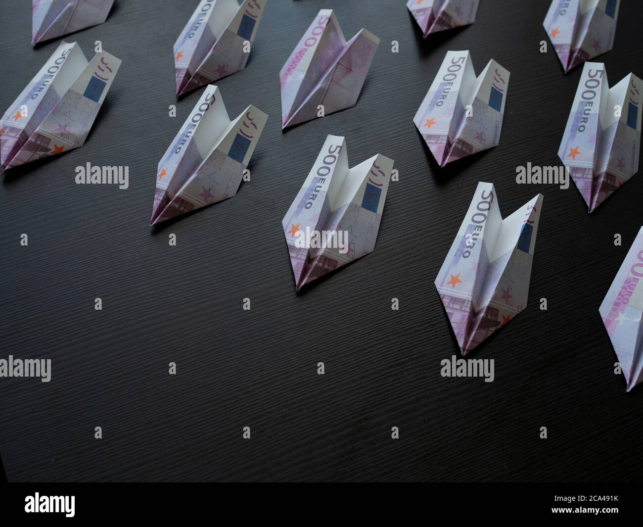 Paper airplanes made of Euro banknotes, the concept of cash flow ...