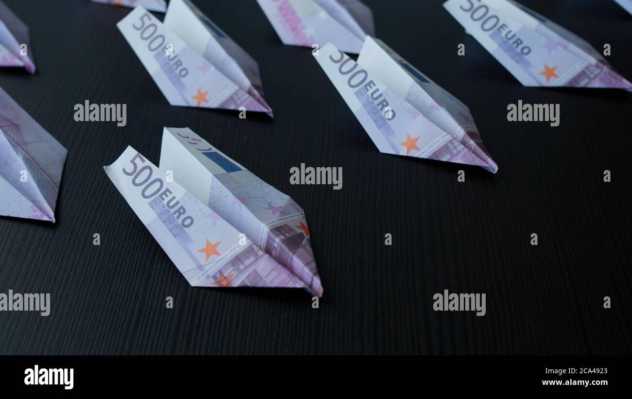 Paper airplanes made of Euro banknotes, the concept of cash flow ...