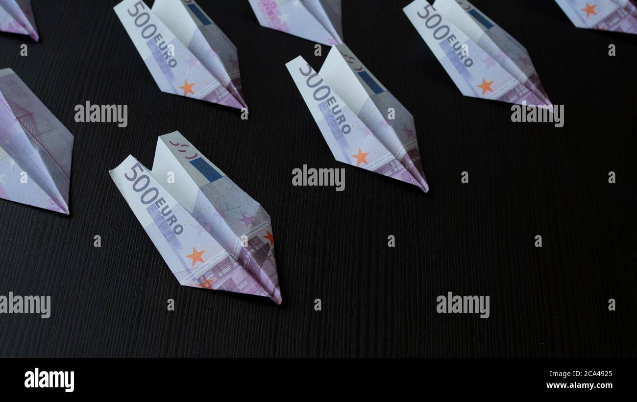 Paper airplanes made of Euro banknotes, the concept of cash flow ...