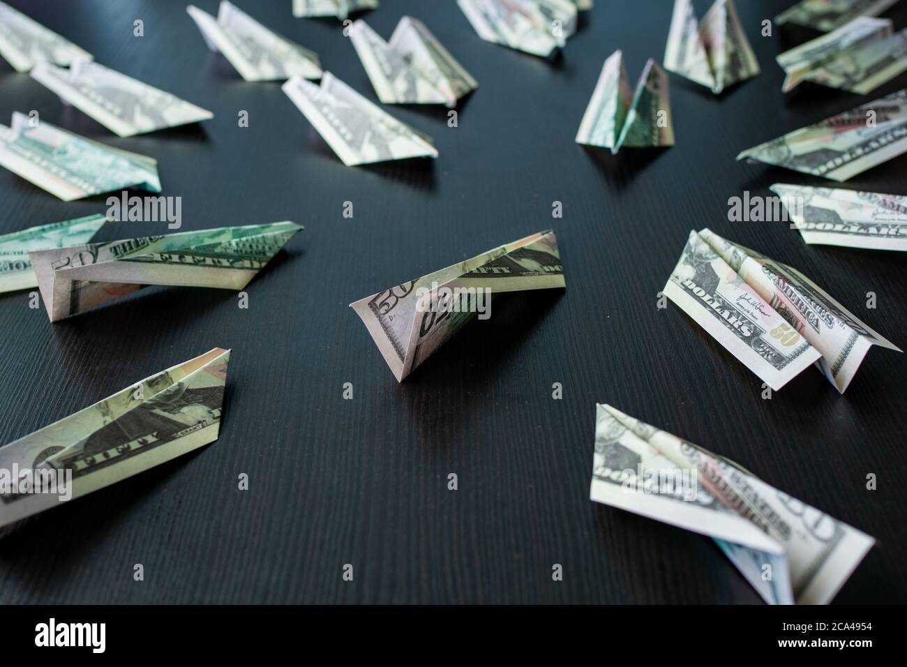 Money flies away hi-res stock photography and images - Alamy