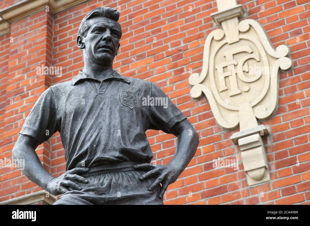 The statue of former player Johnny Haynes stands outside Craven Cottage ...