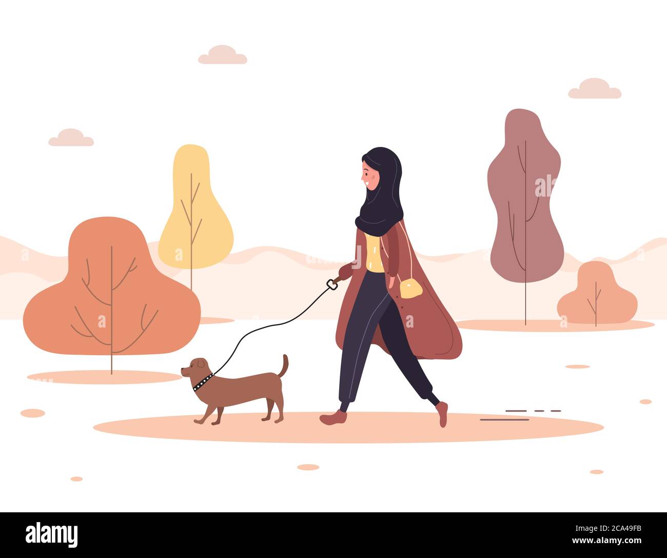 Autumn background. Young arab woman in hijab walks with dog through the ...
