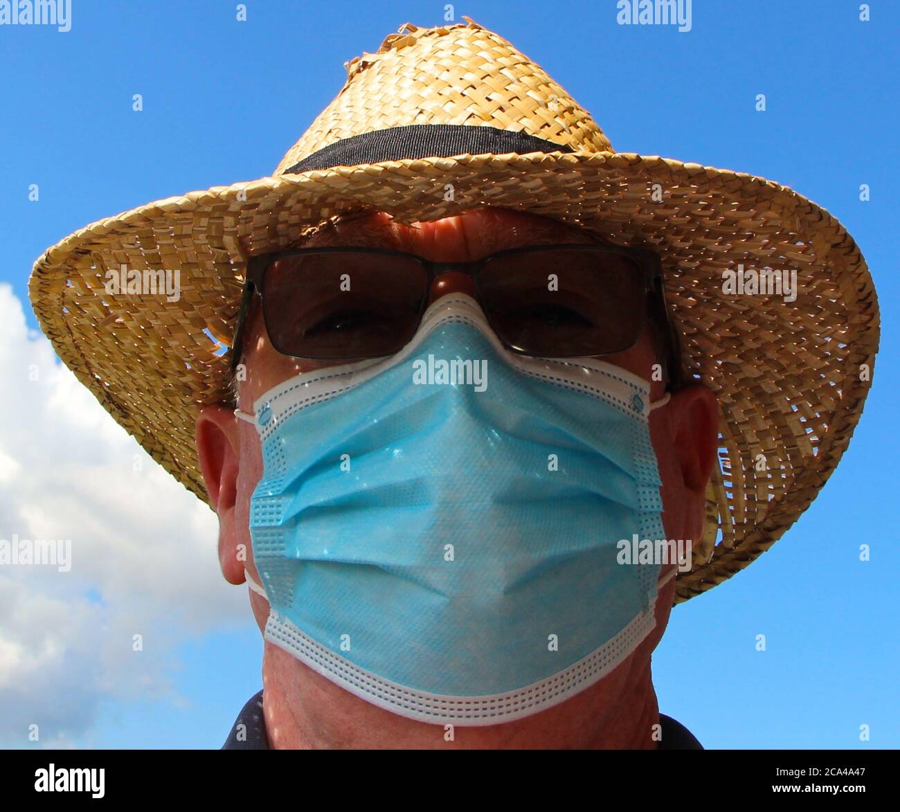 Ready to face the world in a straw hat for head protection sun glasses ...