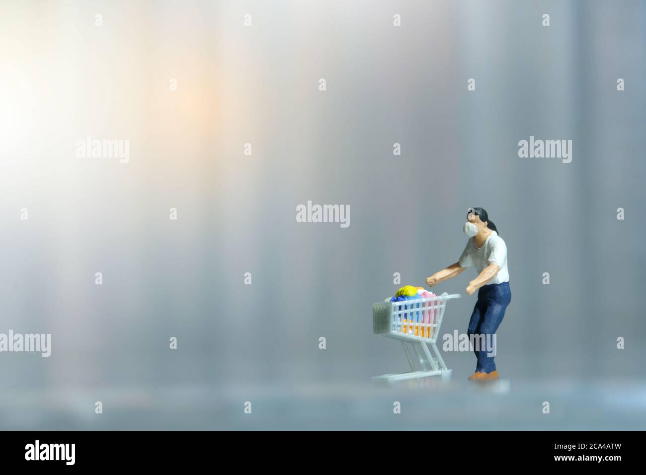 A men doing safe solo shopping at supermarket wearing a face mask ...