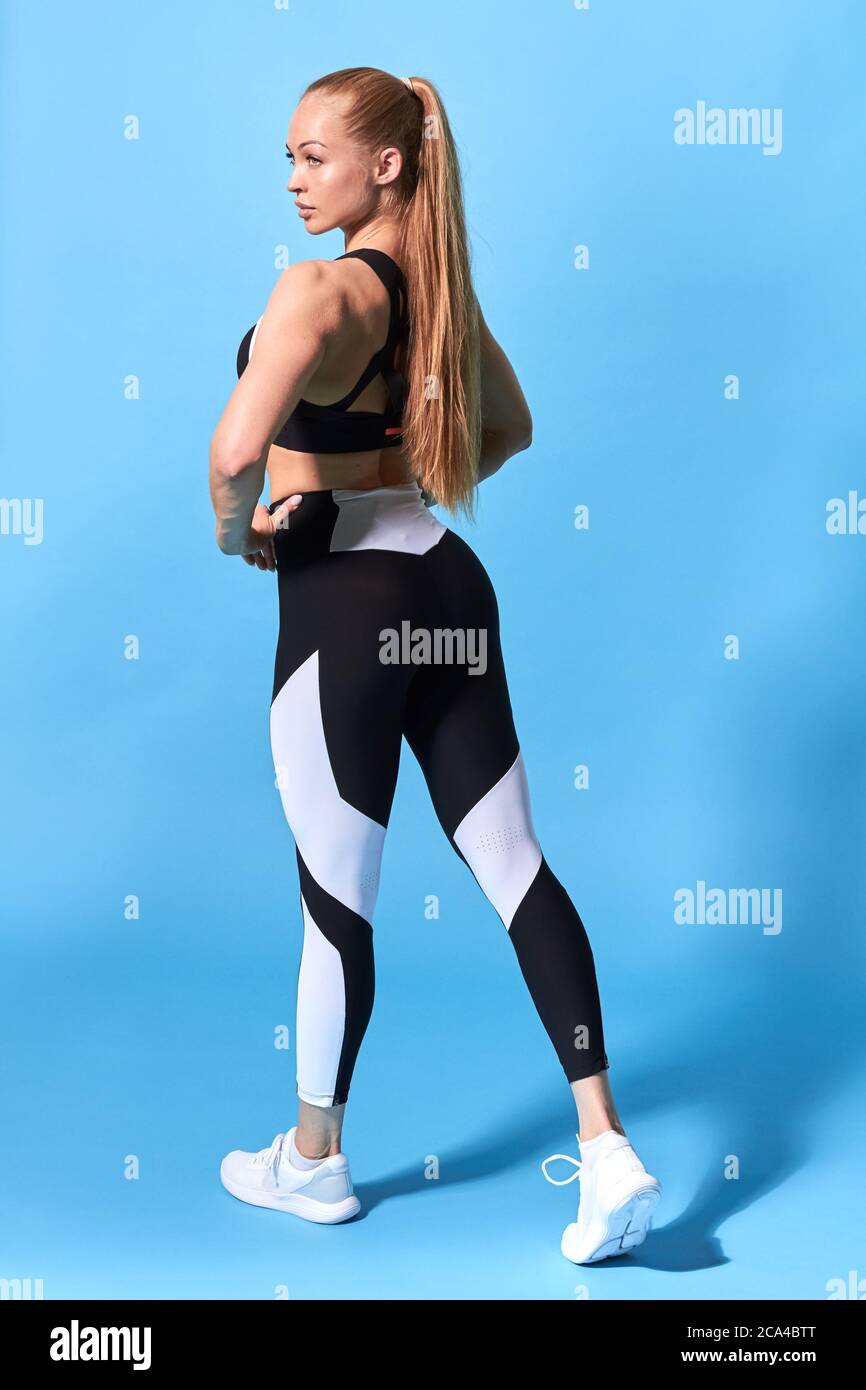 Slim blonde female rear view hi-res stock photography and images - Alamy