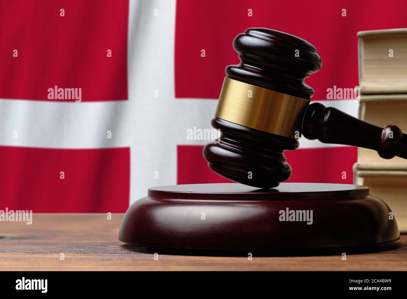 Justice and court concept in Kingdom of Denmark. Judge hammer on a flag ...