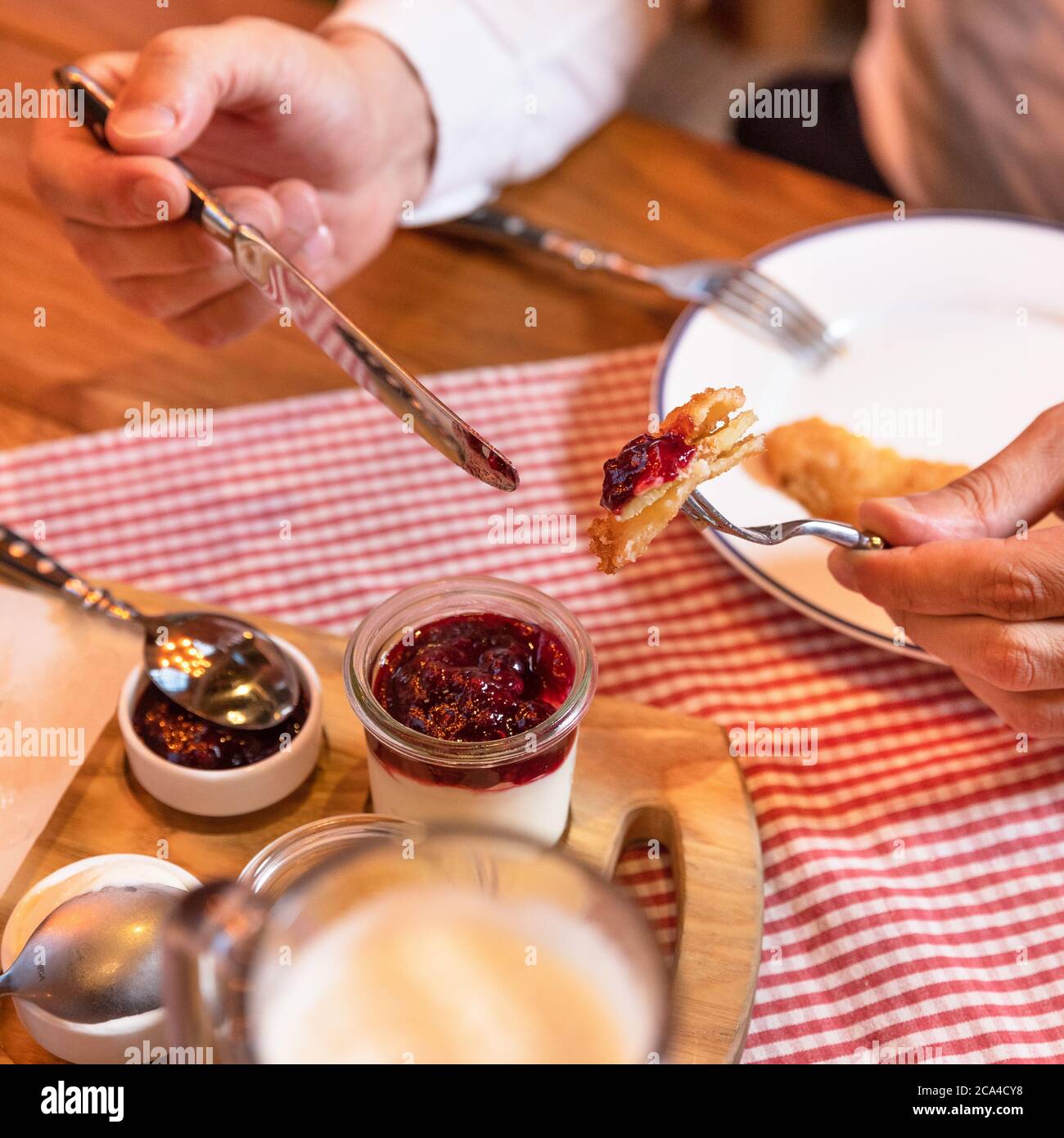 Man eating jam sweet desserts Stock Photo - Alamy