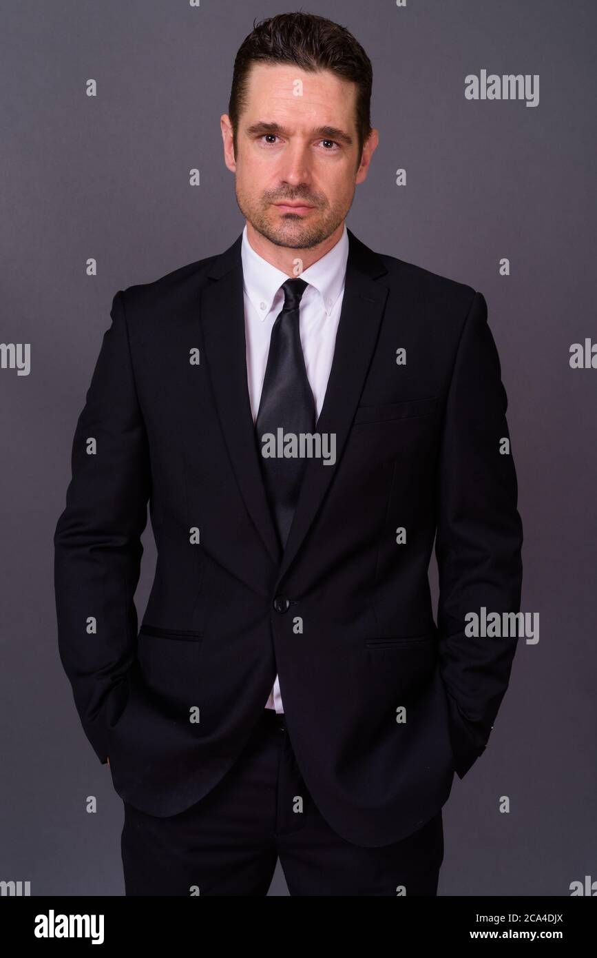 Handsome men in suit hi-res stock photography and images - Alamy