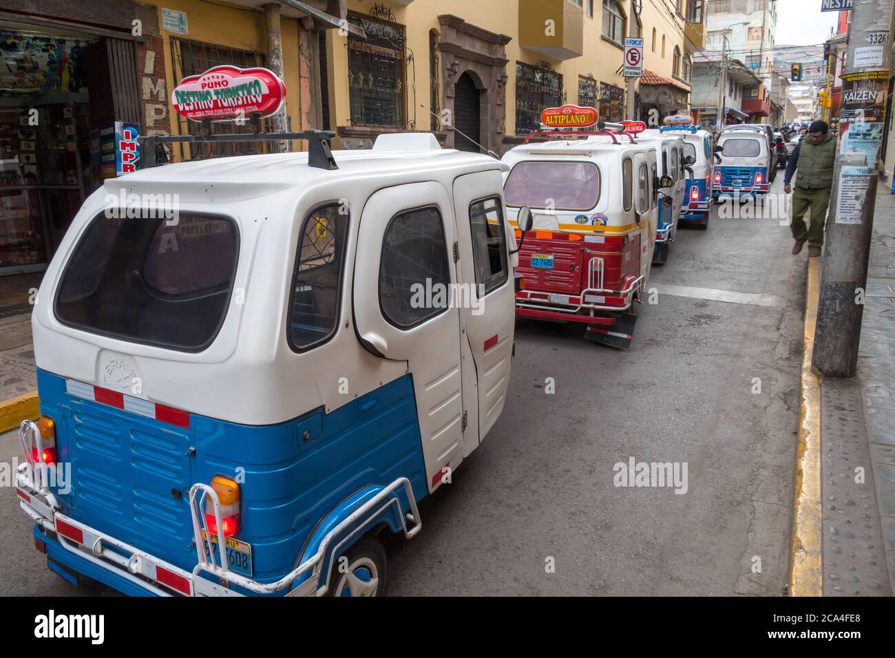Puno, Peru - september 27, 2018: Long line of taxis in the traffic of ...
