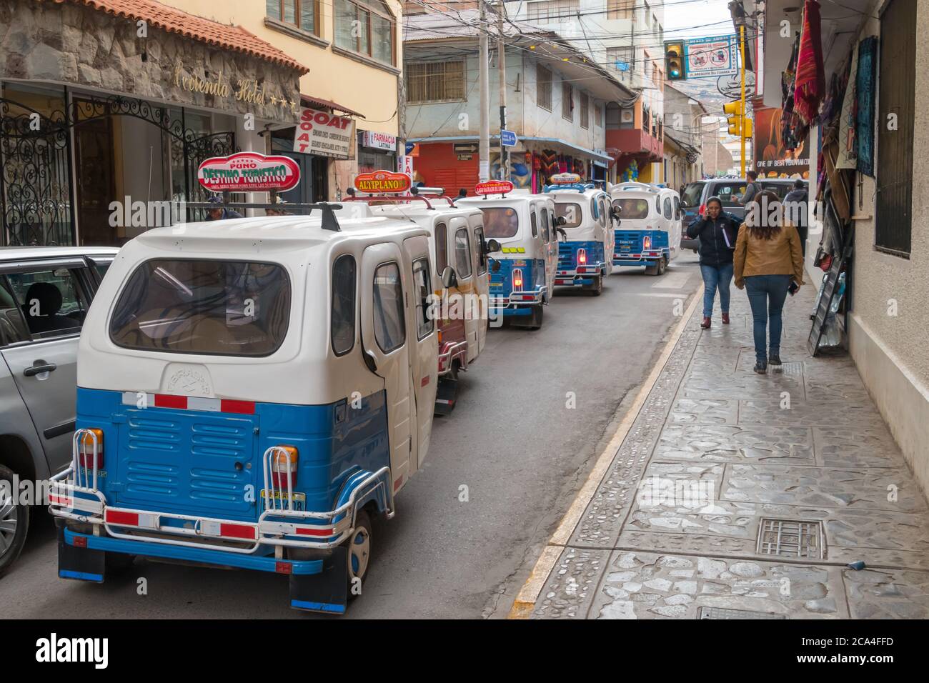 Puno, Peru - september 27, 2018: Long line of taxis in the traffic of ...
