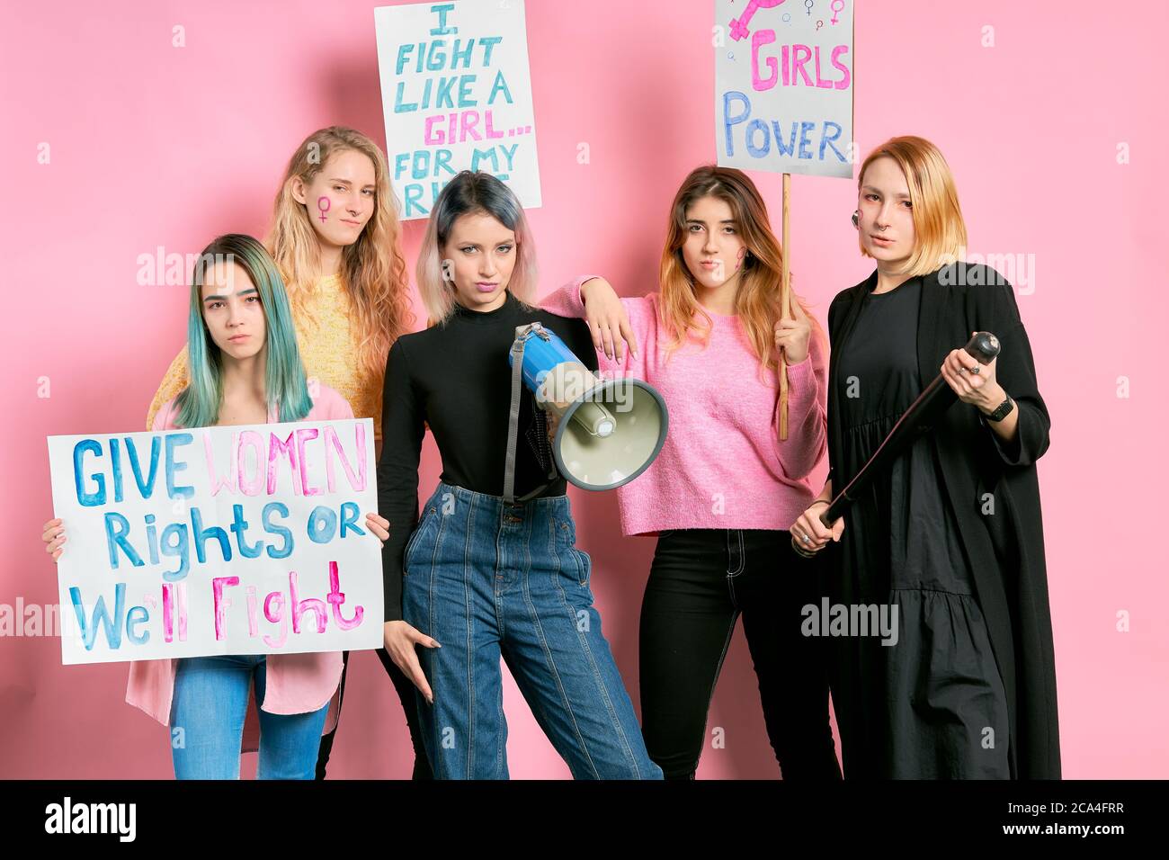 independence, feminism, freedom concept. five young girls feminists ...