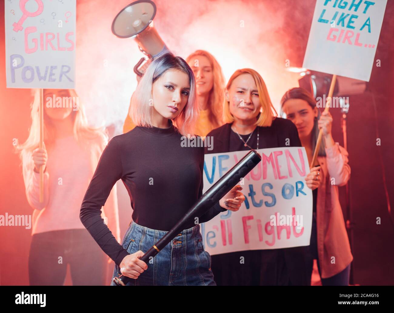 beautiful feminist girl stand holding bat expressing feminism movement ...