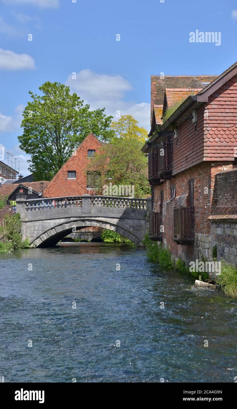 River Itchen flowing through Winchester along side medieval building ...
