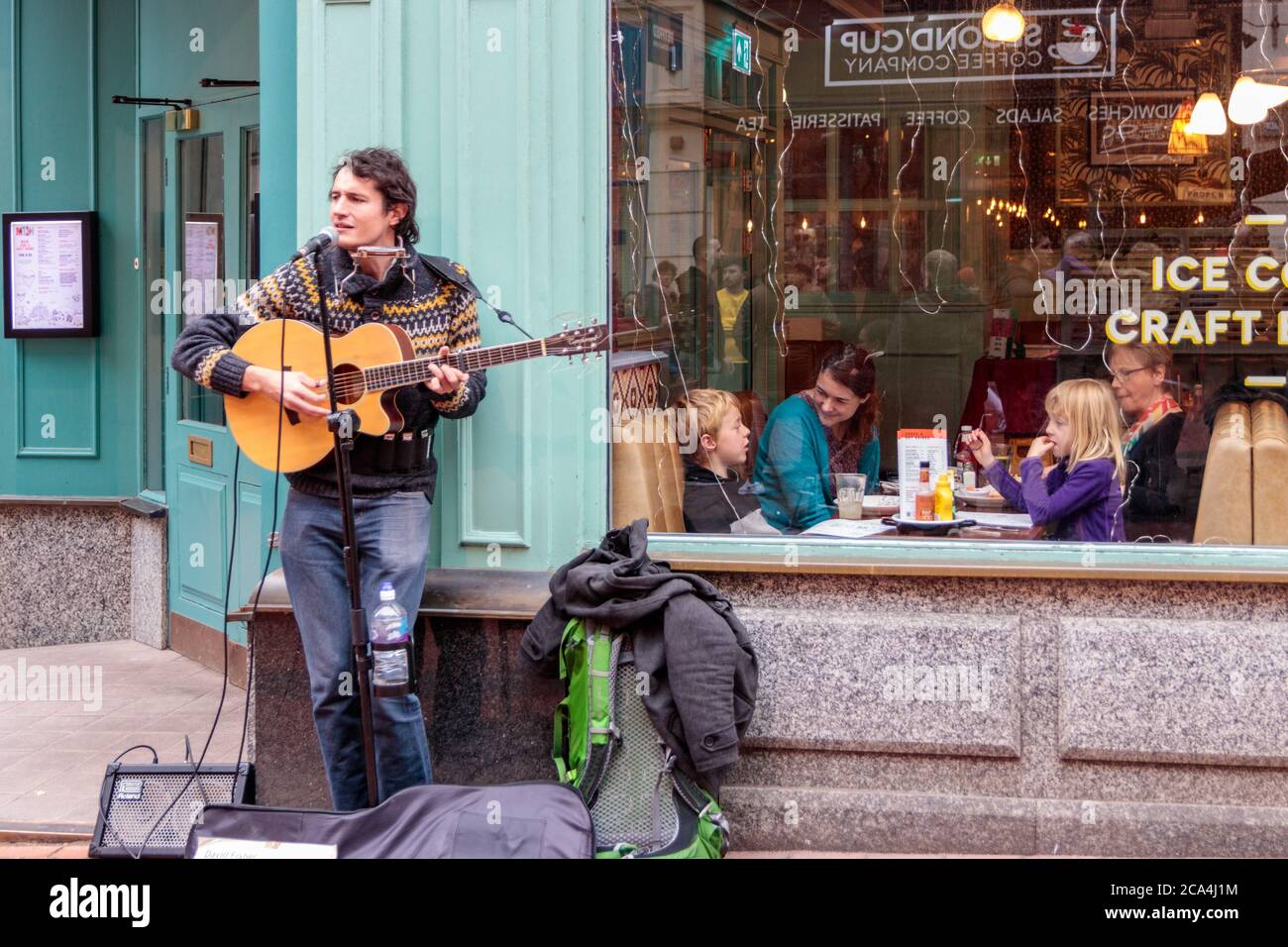 View of street performer outside a cafe, Birmingham City Centre Stock ...