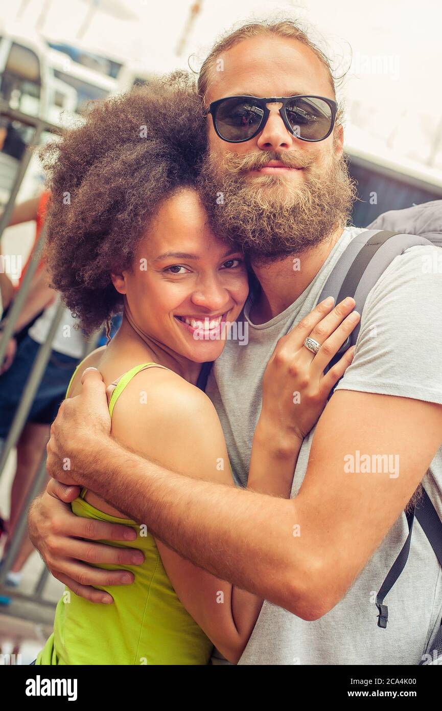 Close up of romantic couple in love at the bus station Stock Photo - Alamy