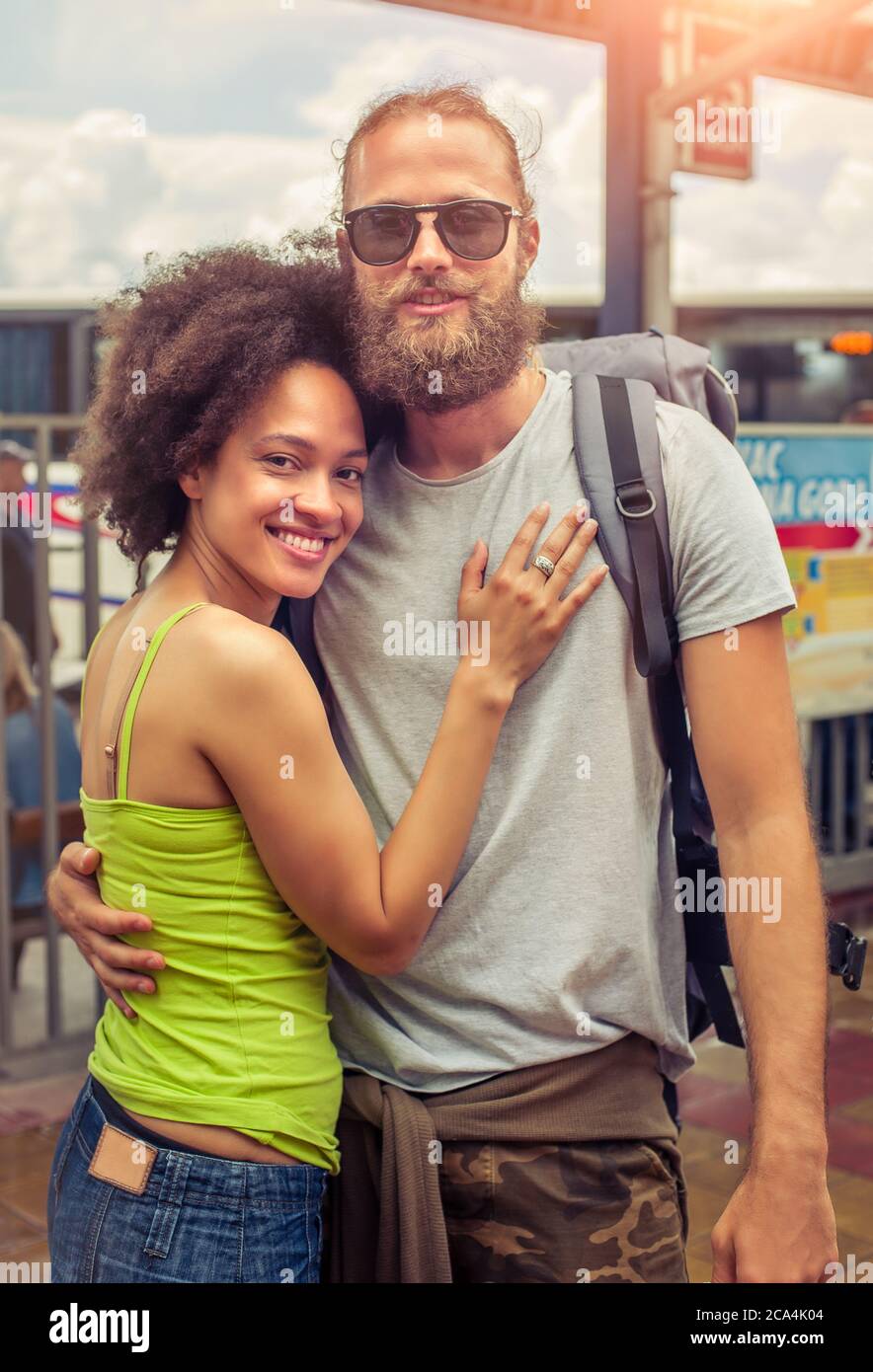 Close up of romantic couple in love at the bus station Stock Photo - Alamy