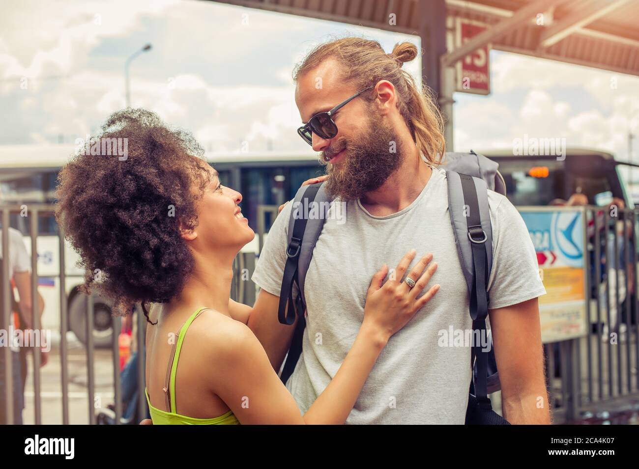 Close up of romantic couple in love at the bus station Stock Photo - Alamy