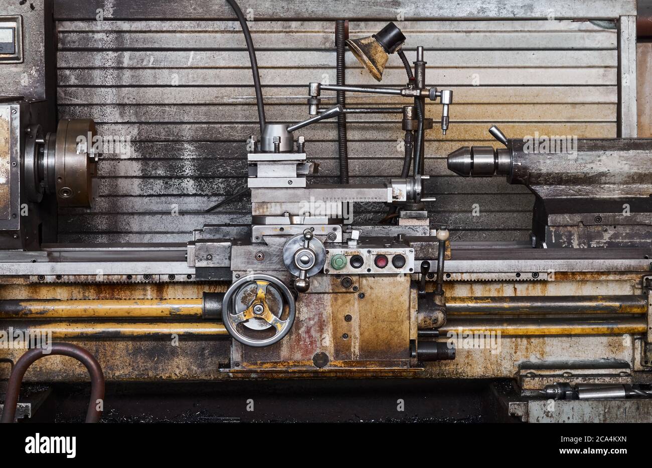 industrial background - used lathe at turner workplace, front view ...