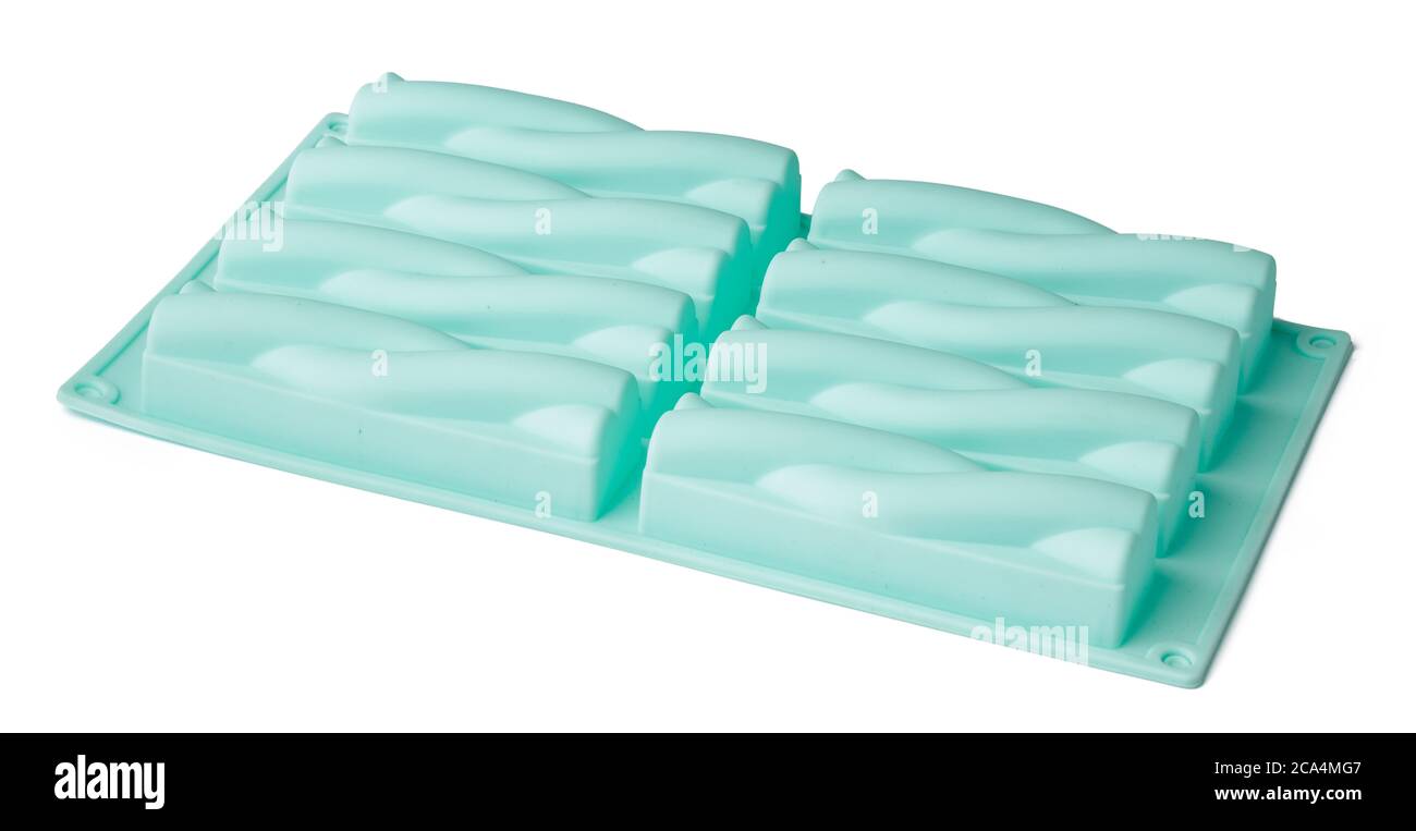 Silicone form for cupcake baking on white background Stock Photo - Alamy