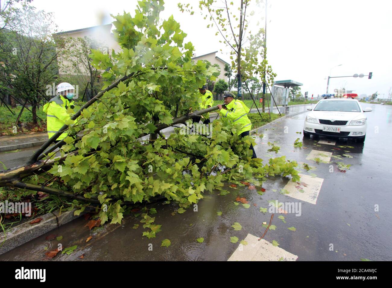 Hangzhou, China's Zhejiang Province. 4th Aug, 2020. Traffic police ...