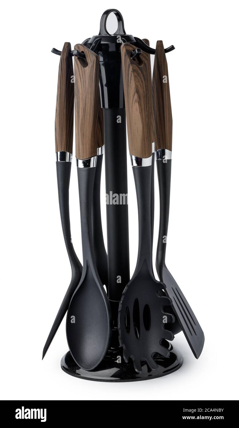 Stand with set of kitchen utensils on white background Stock Photo - Alamy