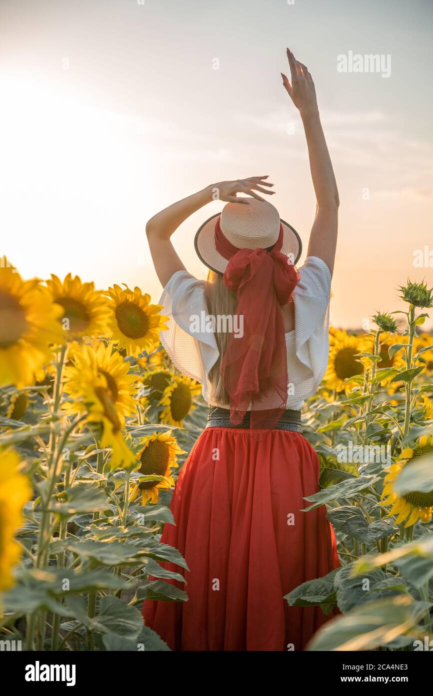 Back view smiling hi-res stock photography and images - Alamy