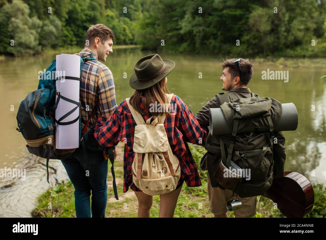 cheerful tourists having fun outdoors, close up back view photo ...