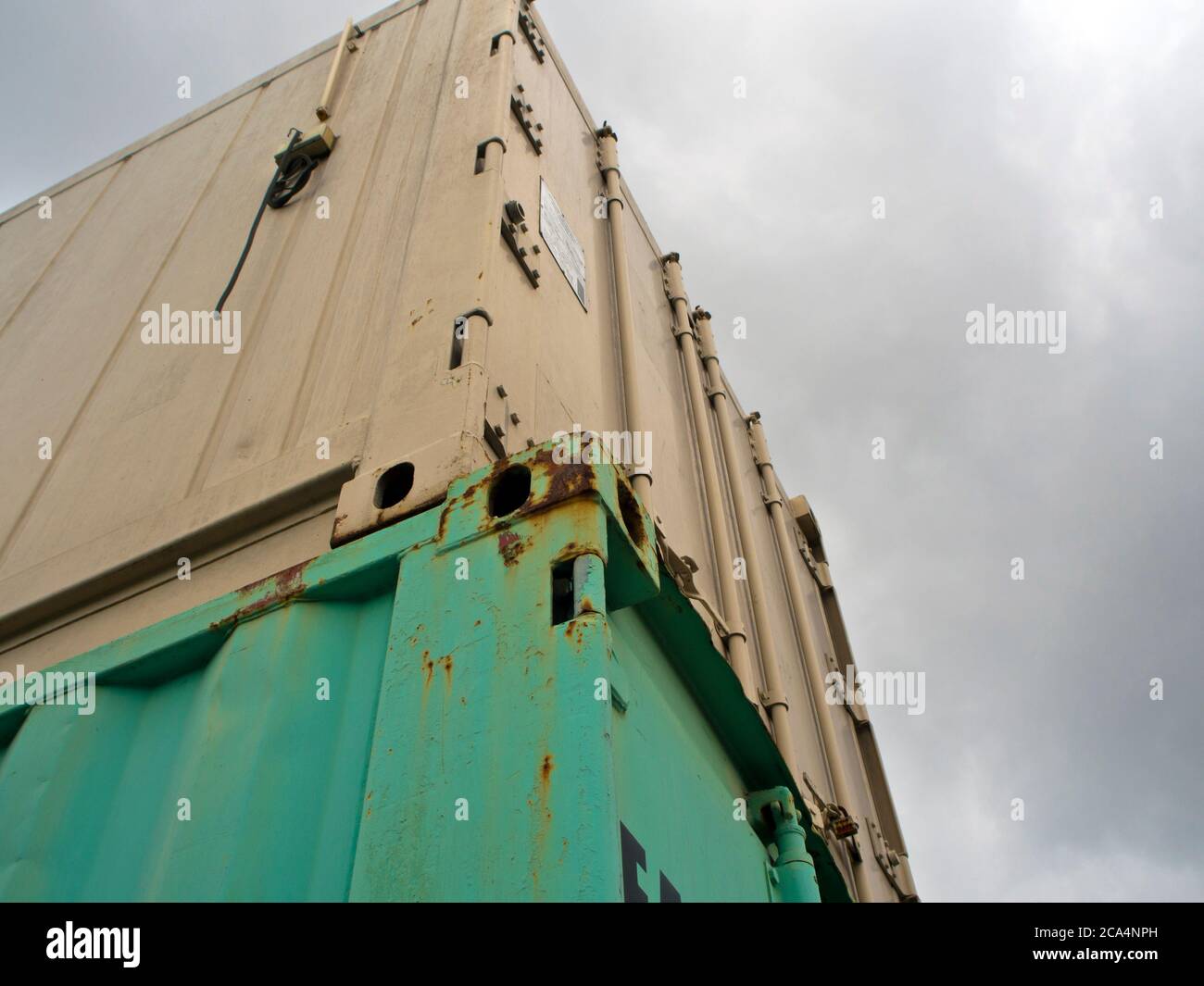 Container cabin place overlap on another container Stock Photo - Alamy