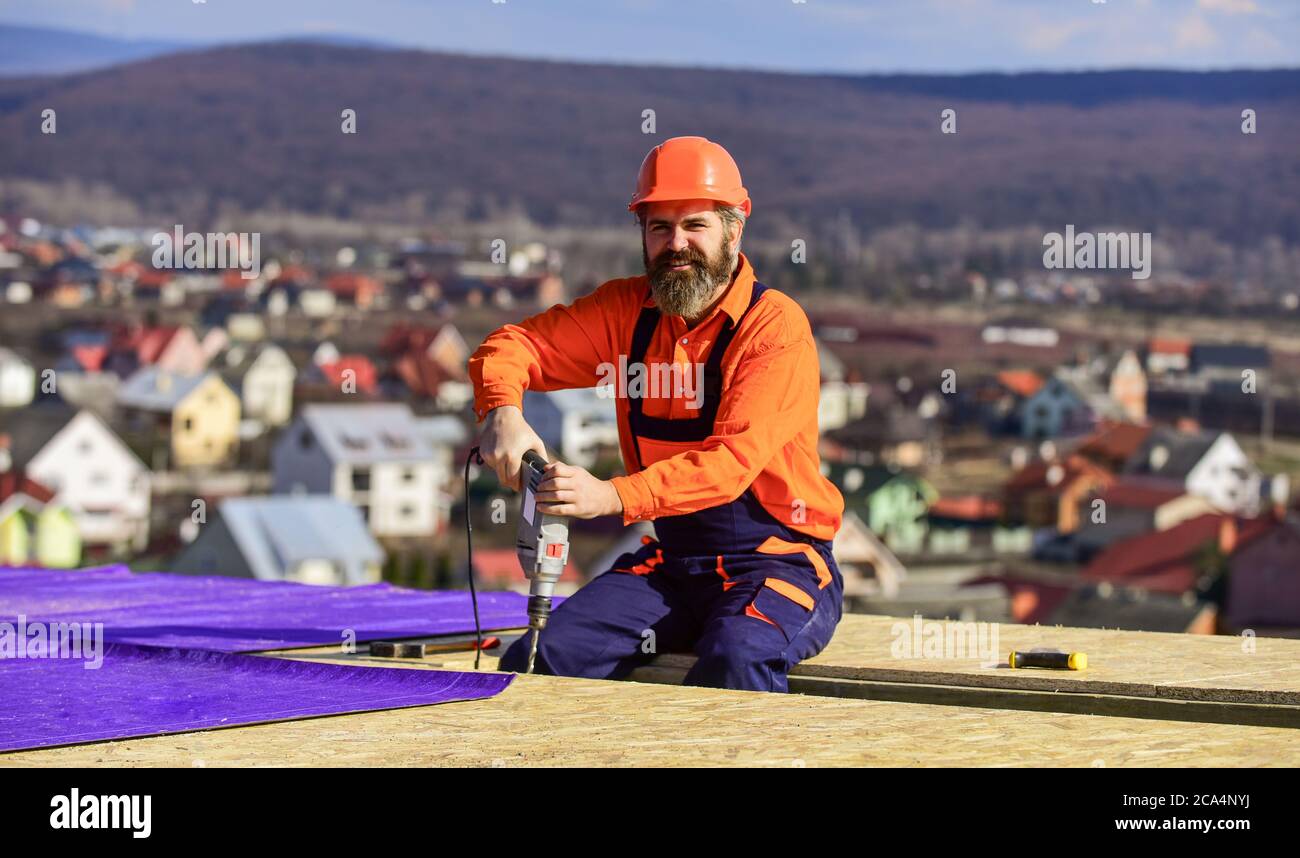 Safety is main point. Roofer working tool. Construction Industry and ...