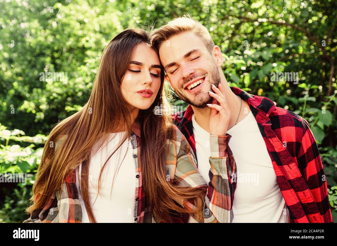 Cuddling with darling. Man hipster and pretty woman in love. Summer ...