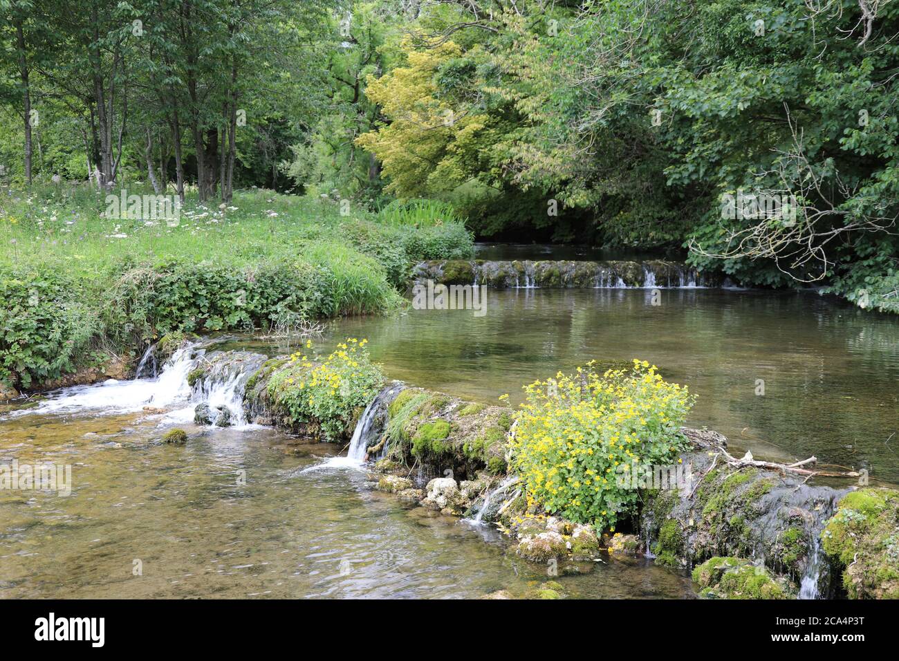 The River Lathkill at Alport near Youlgrave in the Peak District ...