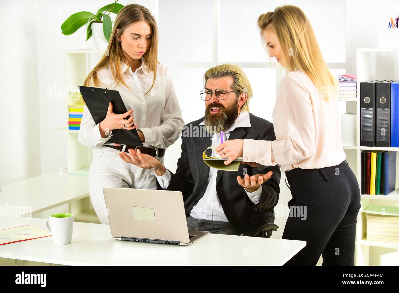 Boss and assistants hi-res stock photography and images - Alamy