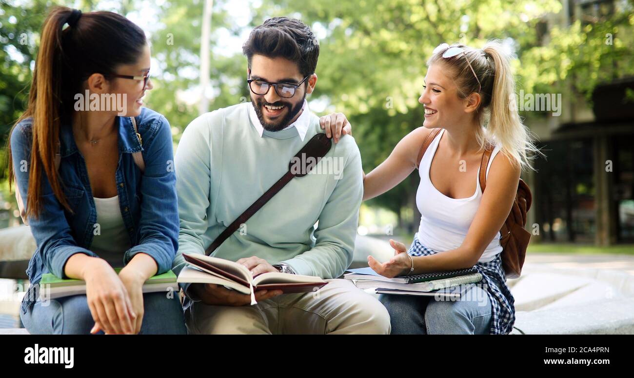College students studying on university campus outdoor Stock Photo - Alamy